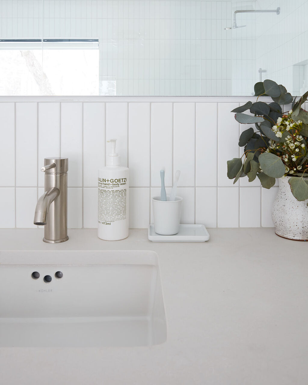 Minimalist Calcite & Gypsum Bathroom | Fireclay Tile