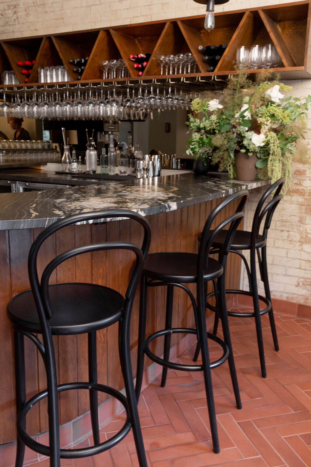 Antique Herringbone Floor Tile at Myrial Restaurant | Fireclay Tile